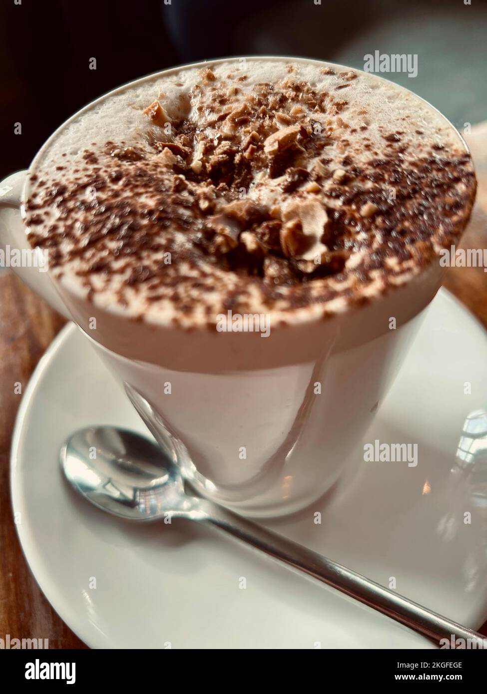 Luxury coffee latte with chocolate hazelnut dusting Stock Photo - Alamy