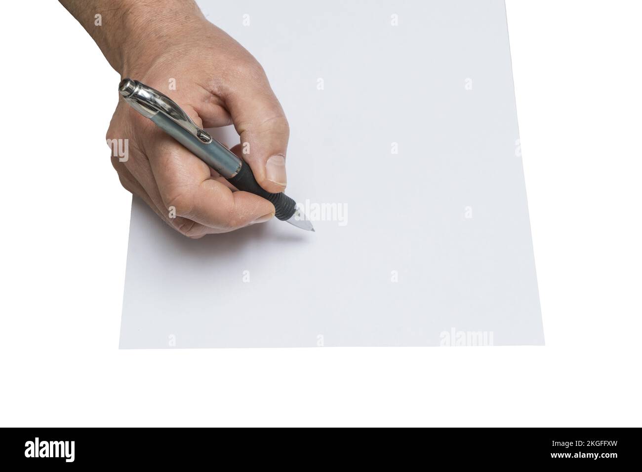 the gesture of a man while he is about to write on a white sheet Stock ...