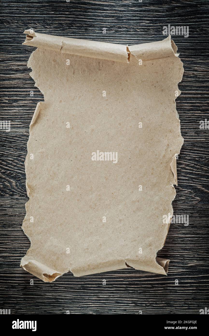Vintage paper scroll on black board Stock Photo - Alamy