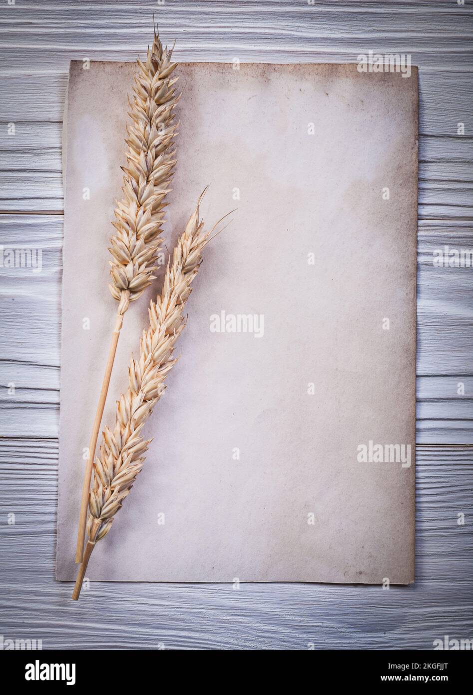 Wheat ear blank vintage paper on wooden board directly above Stock ...