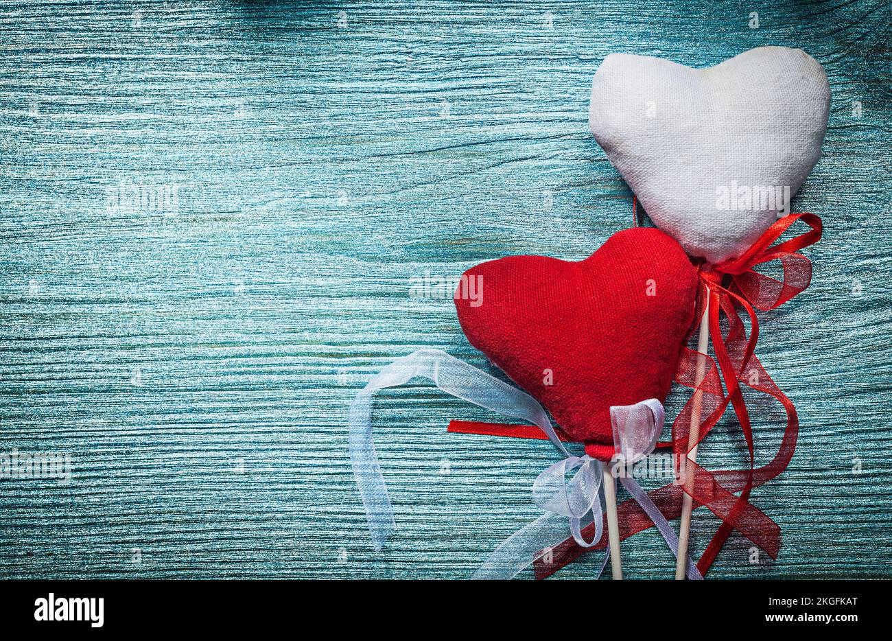 White red hearts with ribbons on wooden board holidays concept Stock ...