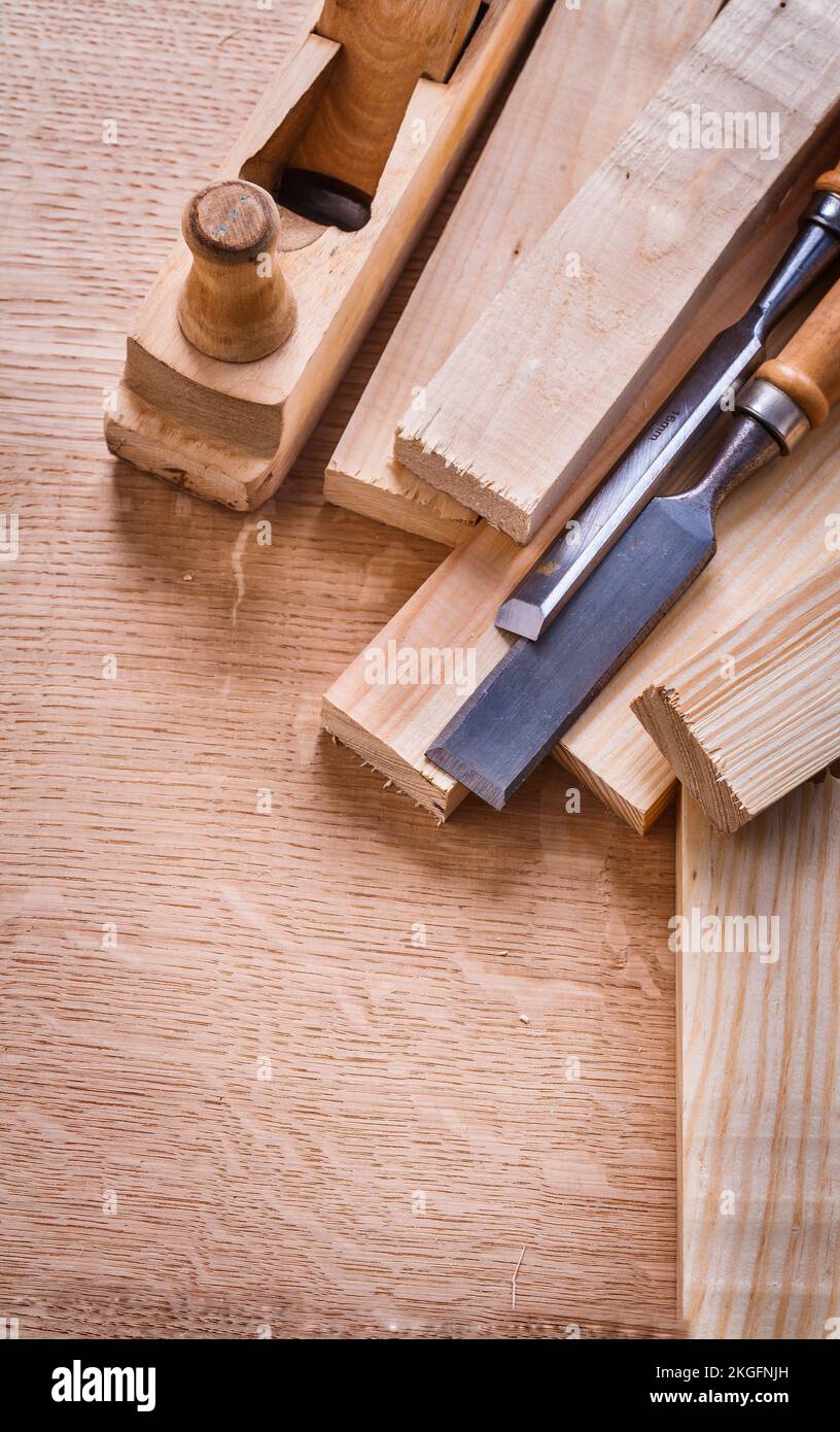 woodworkers plane planks and carpentry chisels on wooden board Stock ...