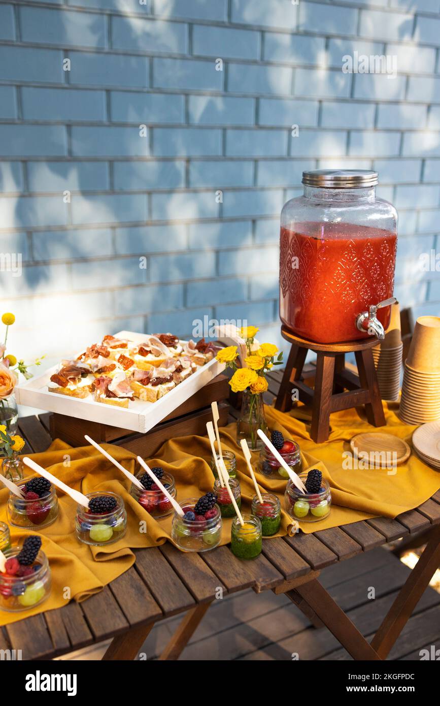 Backyard barbeque party at summer, elegant decoration, luxury catering ...