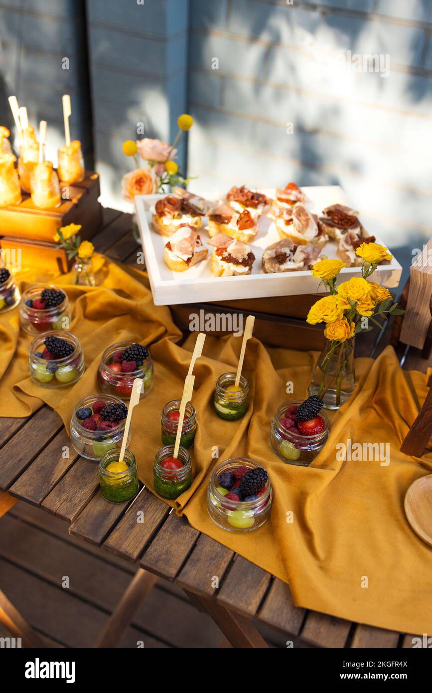 Backyard barbeque party at summer, elegant decoration, luxury catering ...