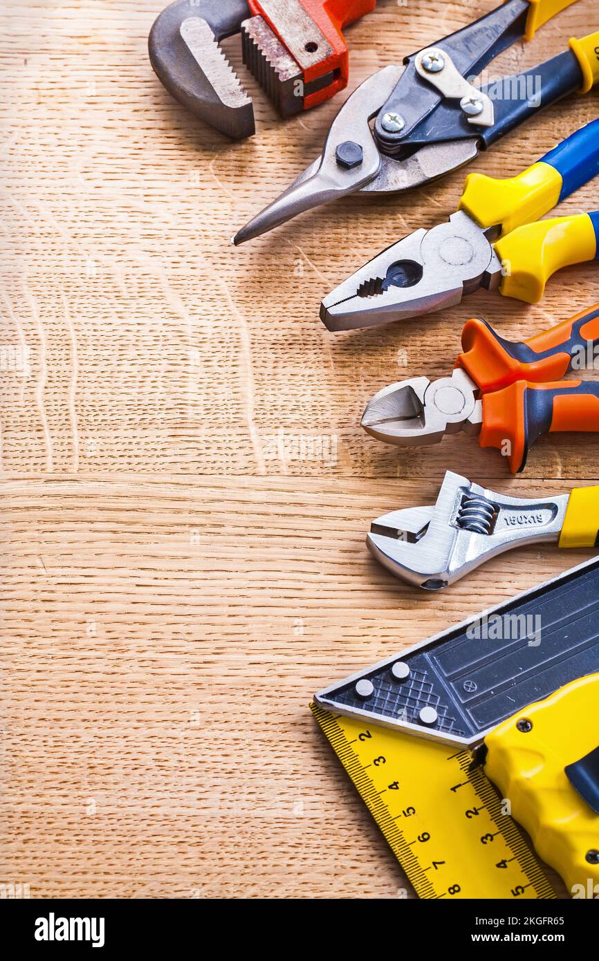 wrench cutter nippers pliers ruller tapeline with organized copyspae on ...