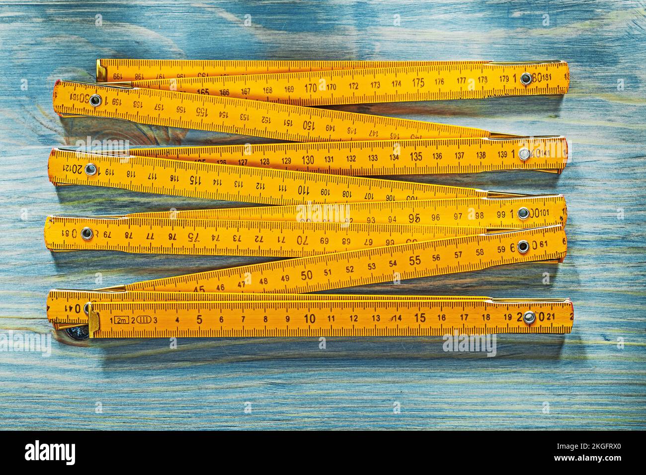 Yellow wooden meter on vintage wood background horizontal view ...