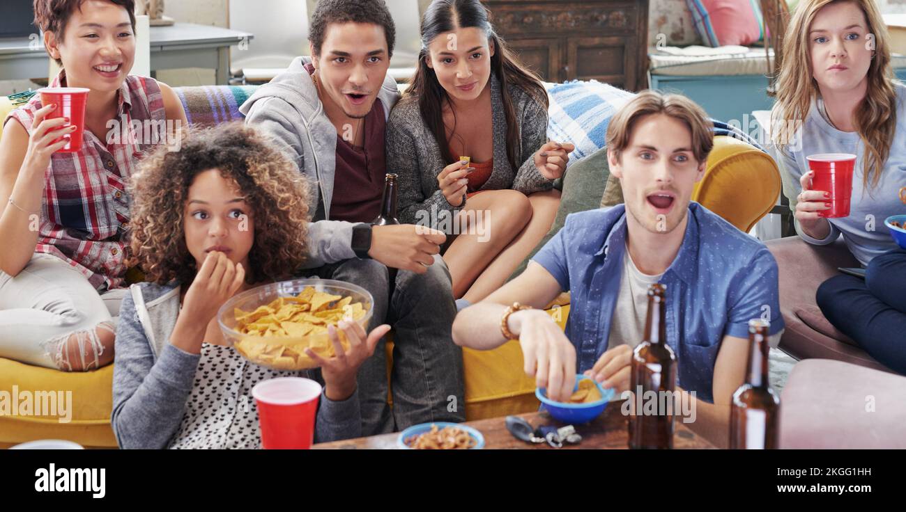 Drinks, food and group of friends watching tv in home, having fun and bonding together. Relax ...