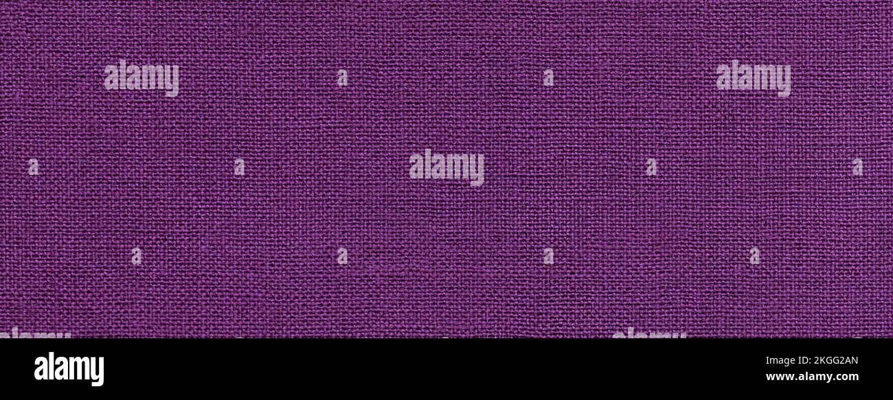 Dark violet background from a textile material with wicker pattern ...