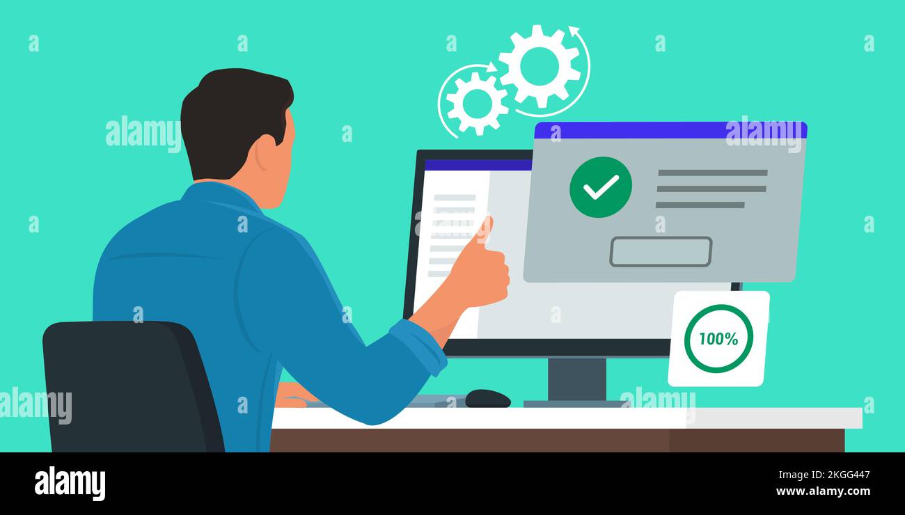 Man sitting at desk using a computer and giving a thumbs up, he ...