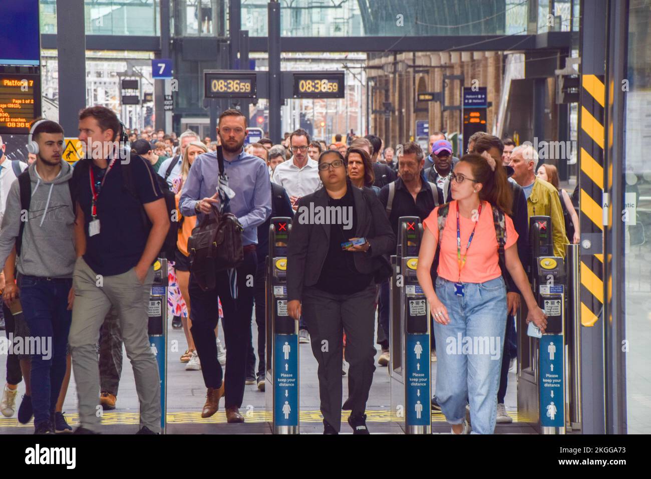 London, UK. 18th August 2022. Commuters arrive at King's Cross Station ...