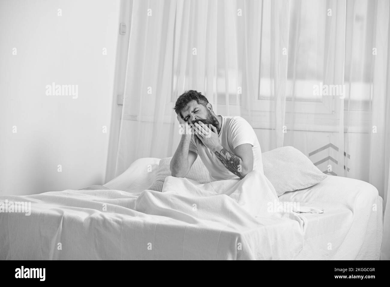 Guy on sleepy tired face yawning. Macho with beard and mustache yawning ...