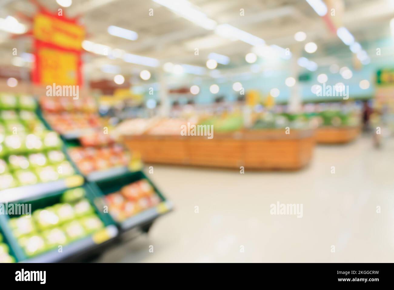 Fruits and vegetables on shelves in supermarket blur background Stock ...