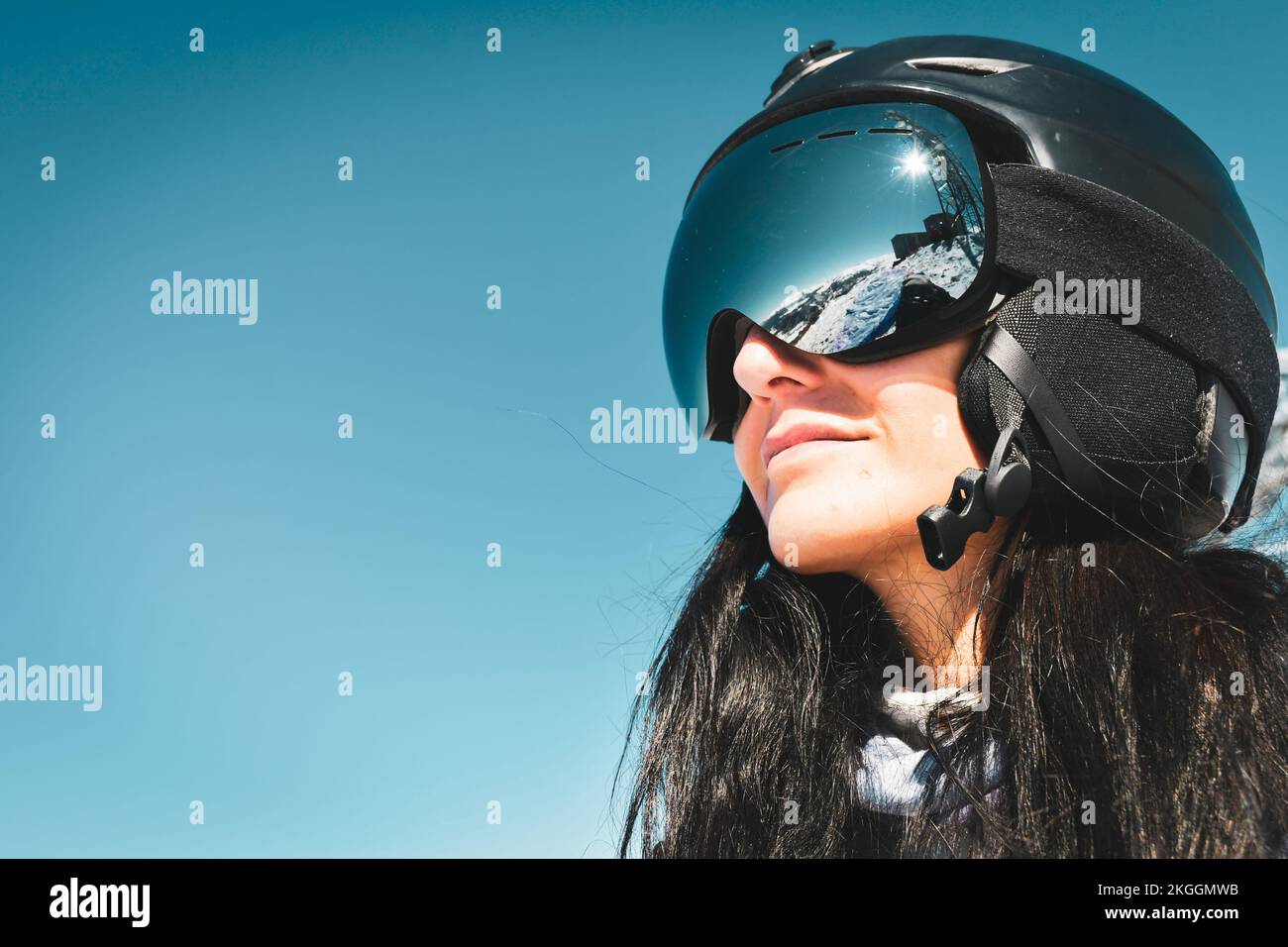 Close up cool snowboarder female person portrait with goggles look out ...