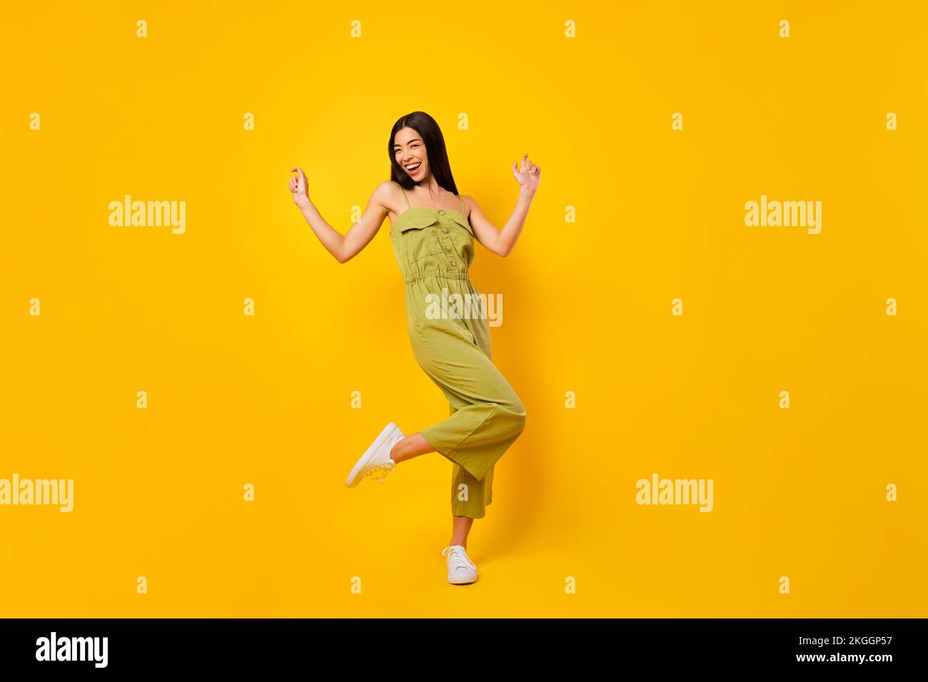 Full body photo of overjoyed positive thai person enjoy dancing ...