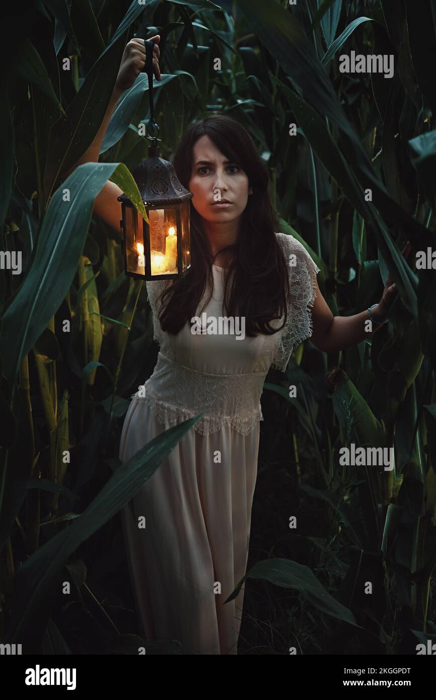 Woman scared in dark hi-res stock photography and images - Alamy