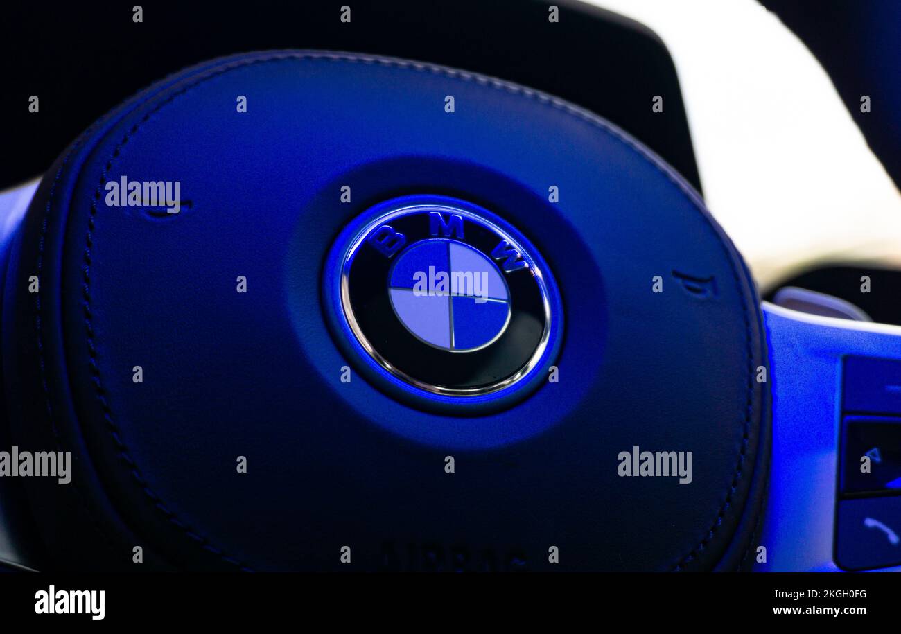 A BMW 320i Steering wheel badge under blue light, horizontal Stock ...
