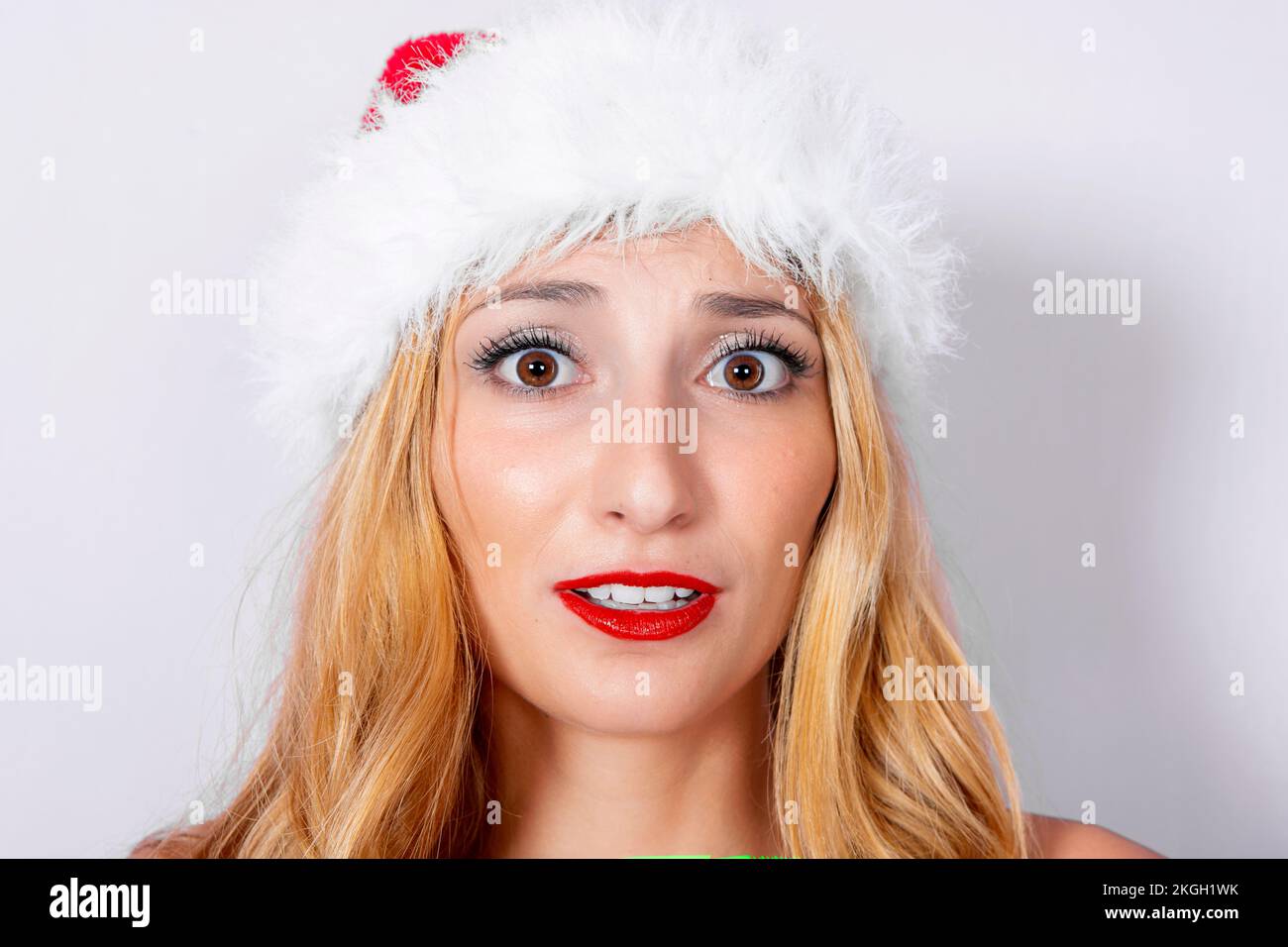 woman's face with christmas cap and cute expression Stock Photo - Alamy