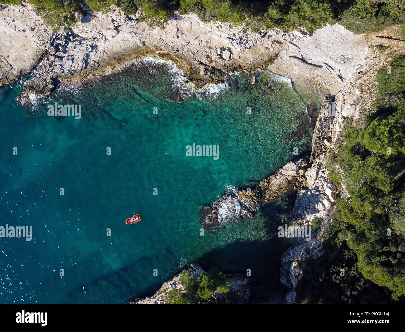 An aerial top view of the Galebove Stijene shore in Medulin, Croatia ...