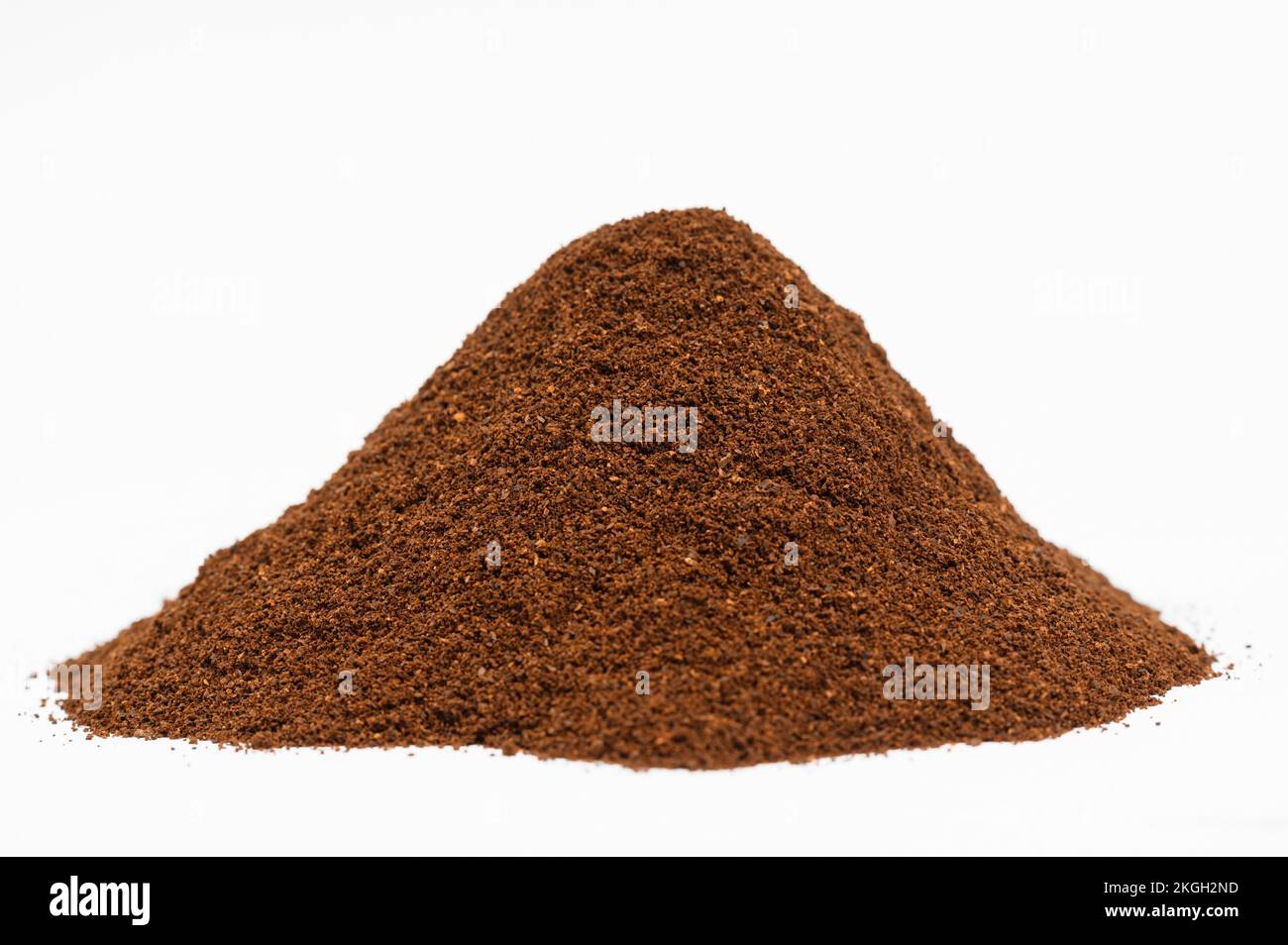 heap of ground coffee on a white background, free place for writing ...