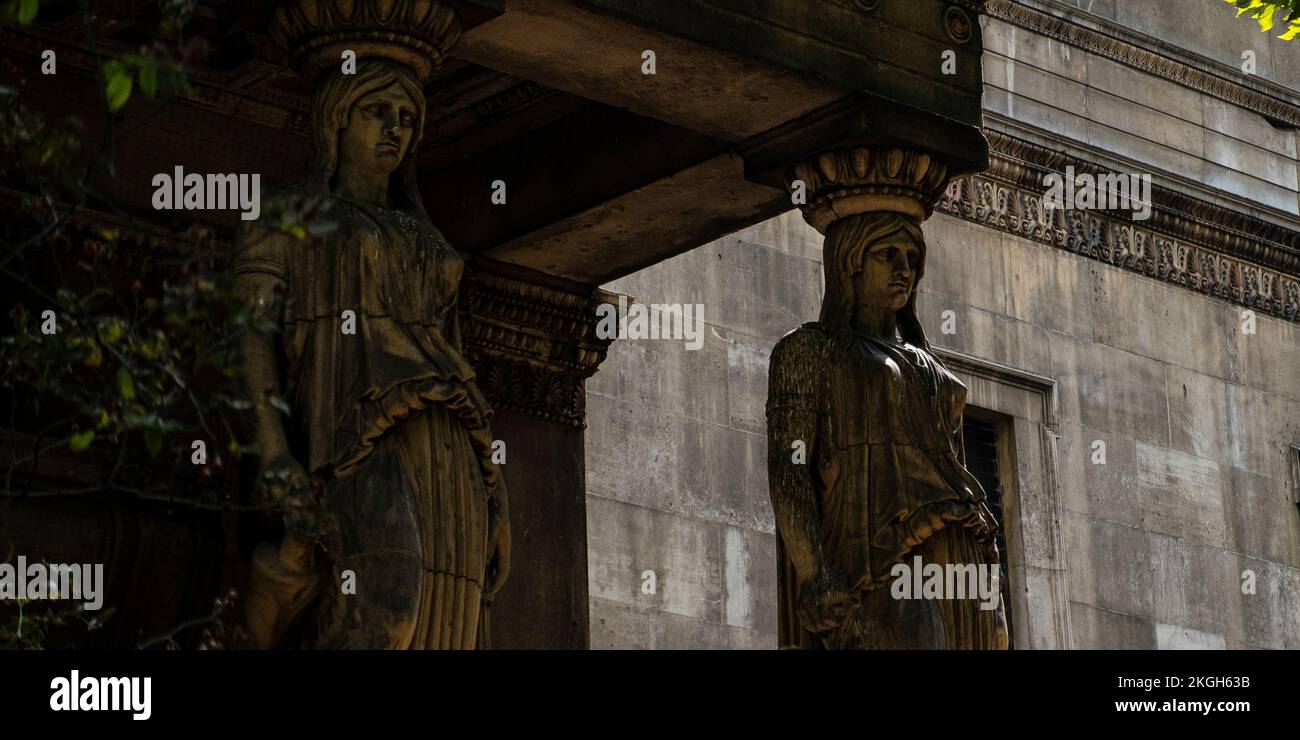 A female-shaped columns of an ancient temple Stock Photo - Alamy