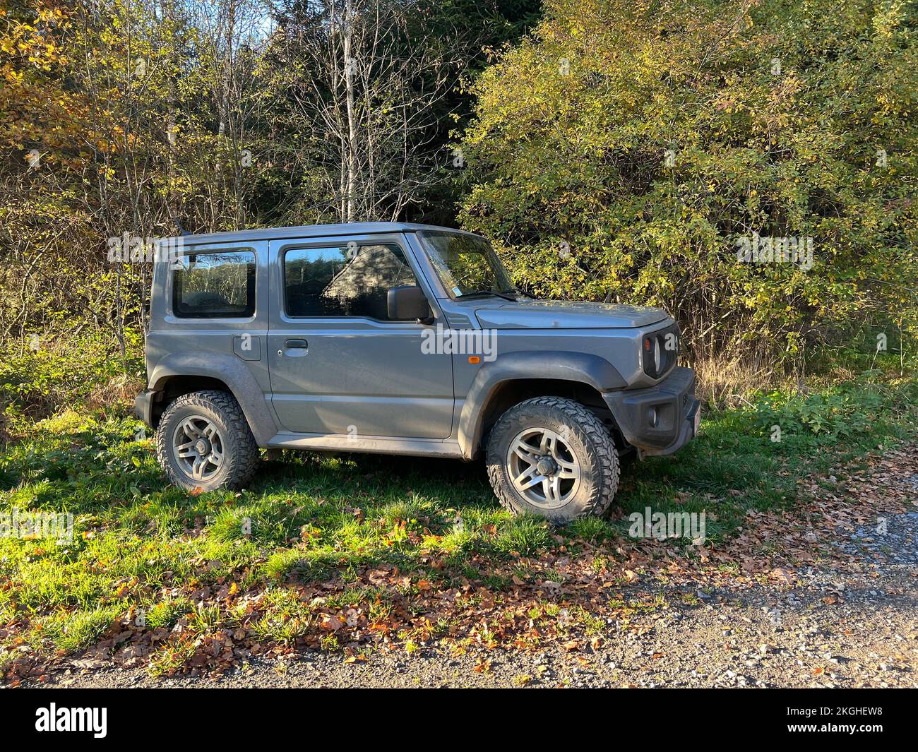 A Suzuki Jimmy, small jeep parked in a forested area Stock Photo - Alamy