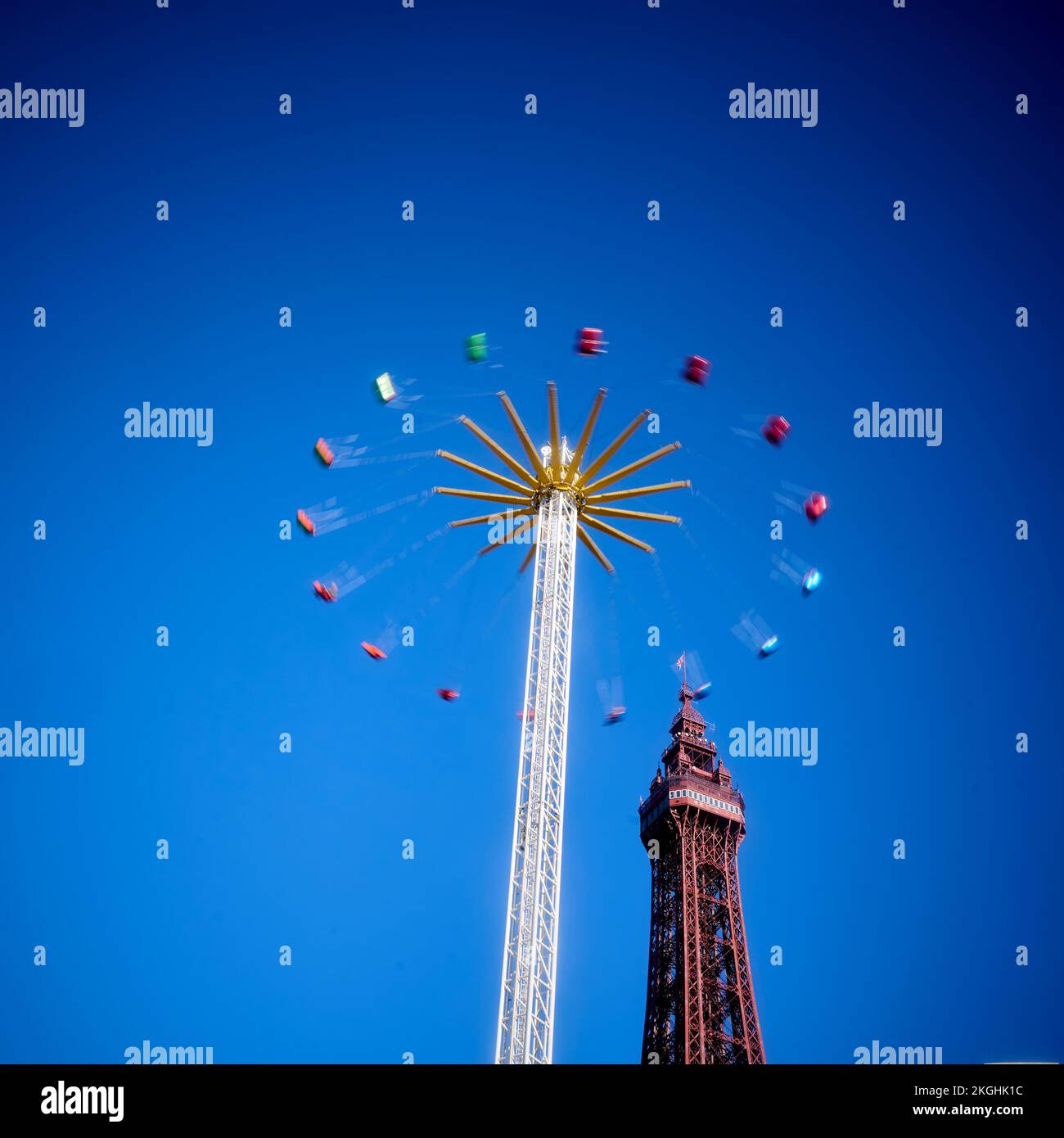 Star Flyer ride with Blackpool Tower in the background on a sunny ...
