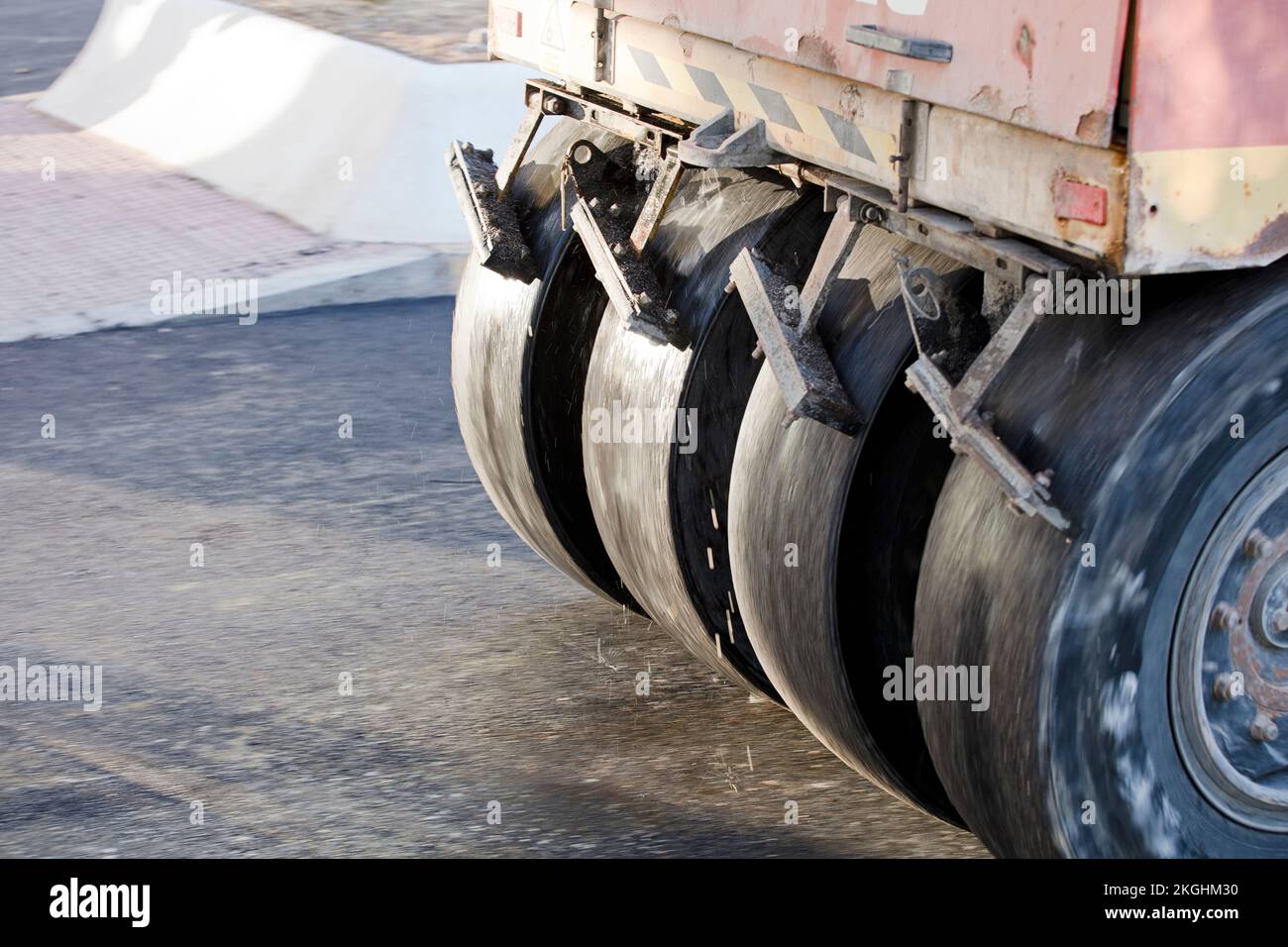 Road construction equipment coating asphalt black top lane Stock Photo ...