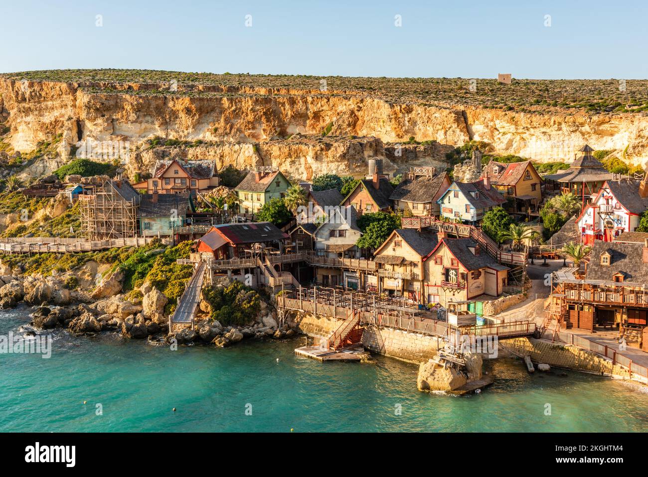 Malta, Il-Mellieha. View of the famous Popeye Village in Anchor Bay ...