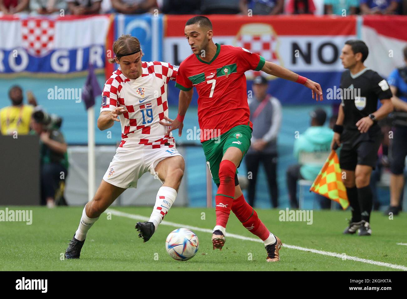 Al Khor, Qatar.November 23, 2022, Borna Sosa of Croatia in action with m19 of Morocco during the ...