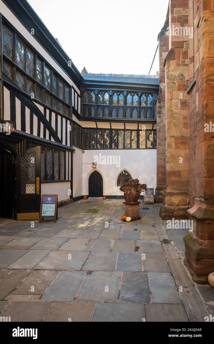 A plaque at the entrance to the historic St. Marys Guildhall in the city of Coventry, UK Stock ...