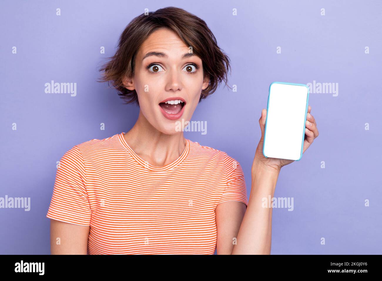 Close up photo of astonished lady hand hold show device gadget ...