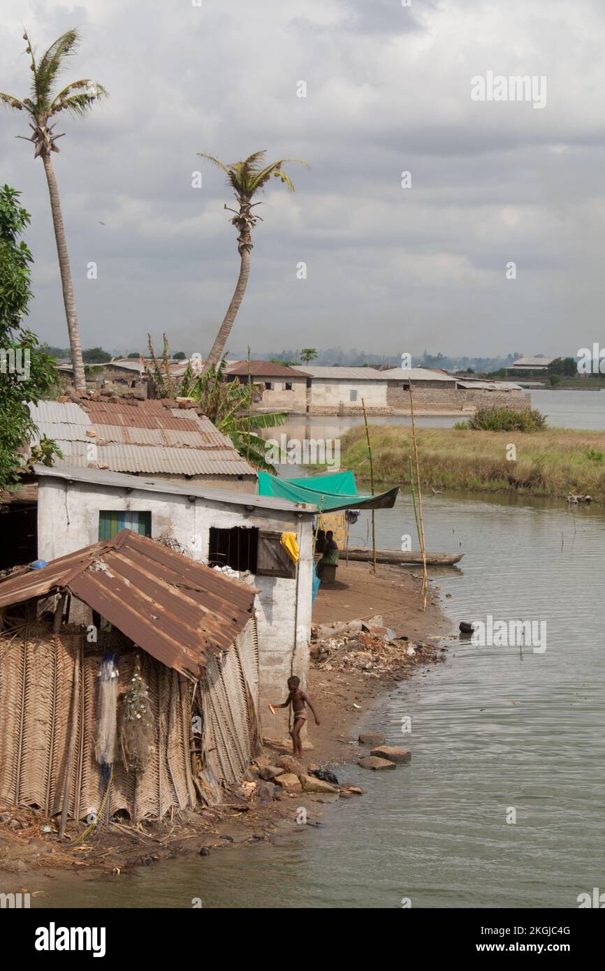 View of Lake Aheme with some houses in the foreground, Benin, West ...