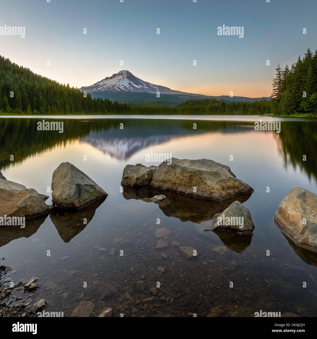 The calm Trillium lake view reflecting trees and clear sky background ...