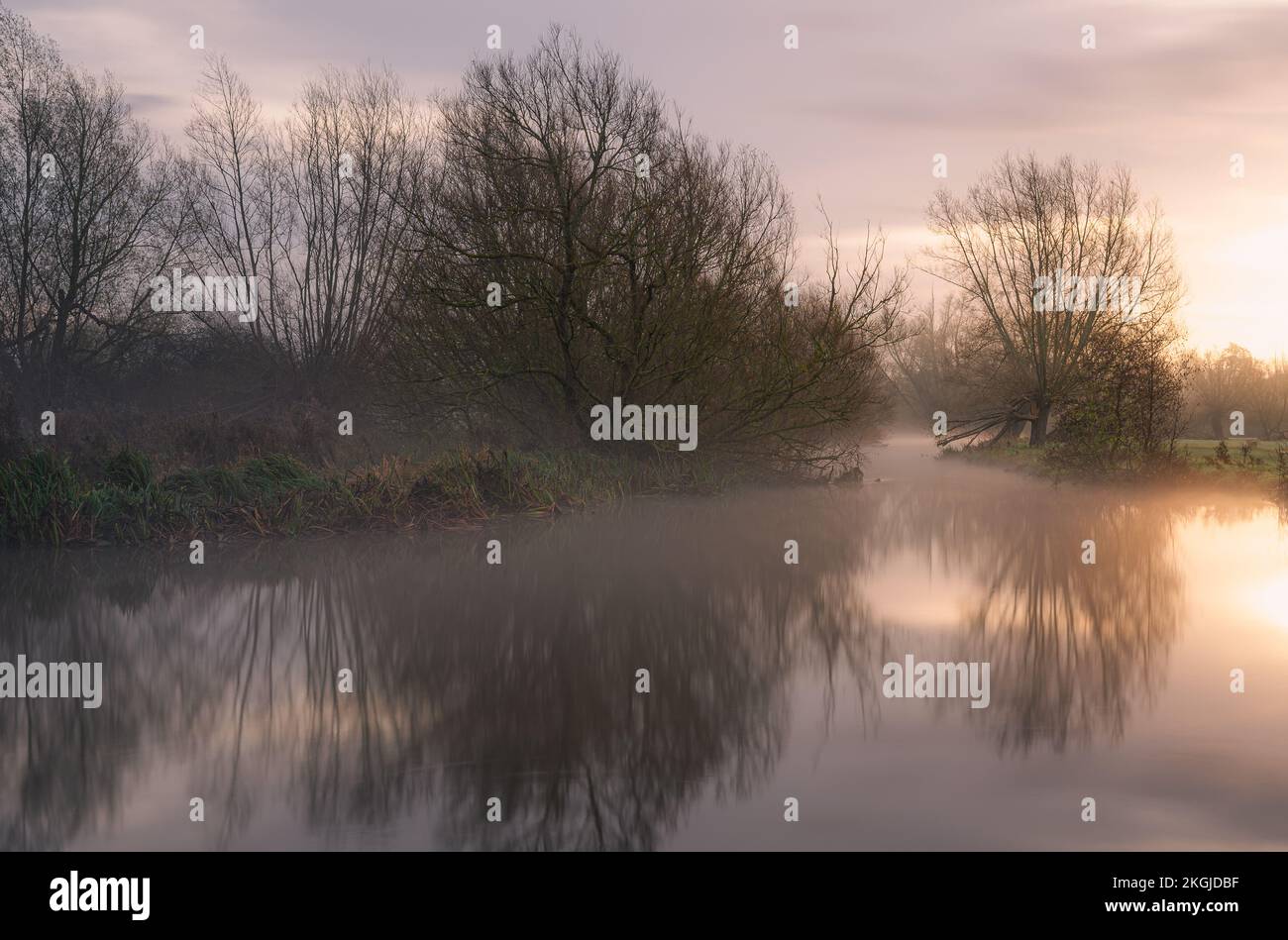 Sunrise by the river Stour between Dedham and Flatford in Suffolk ...