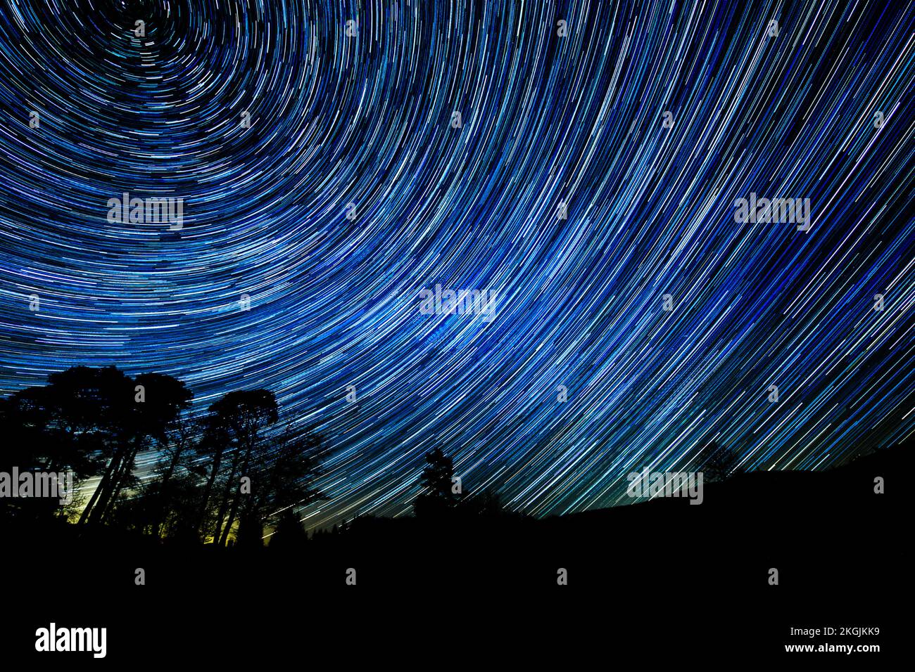 Long exposure astro photograph with lots of star trails circulating in ...