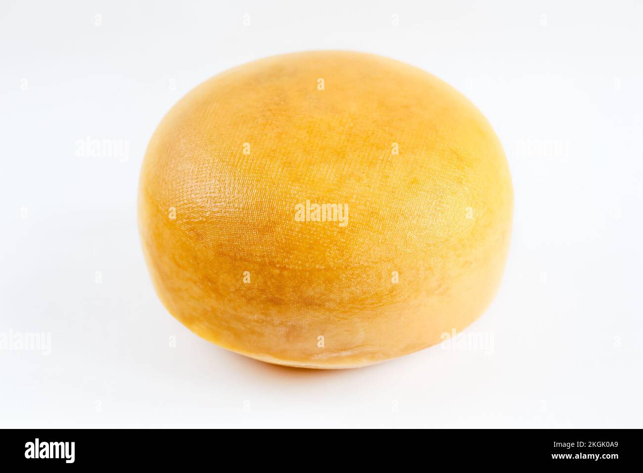 Cheese - yellow round cheese isolated on white background Stock Photo ...