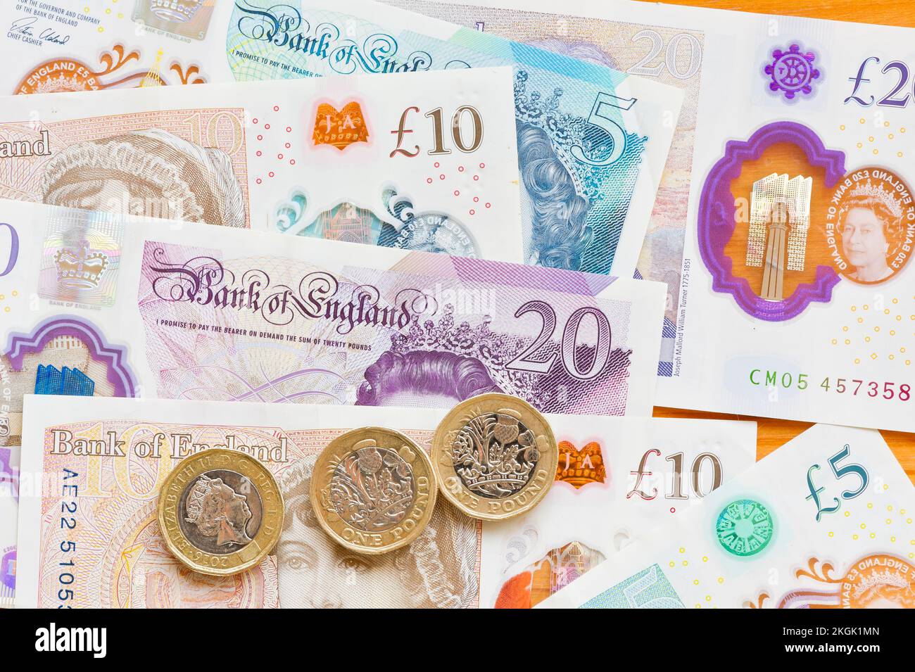 Pounds Sterling cash on a table Stock Photo - Alamy