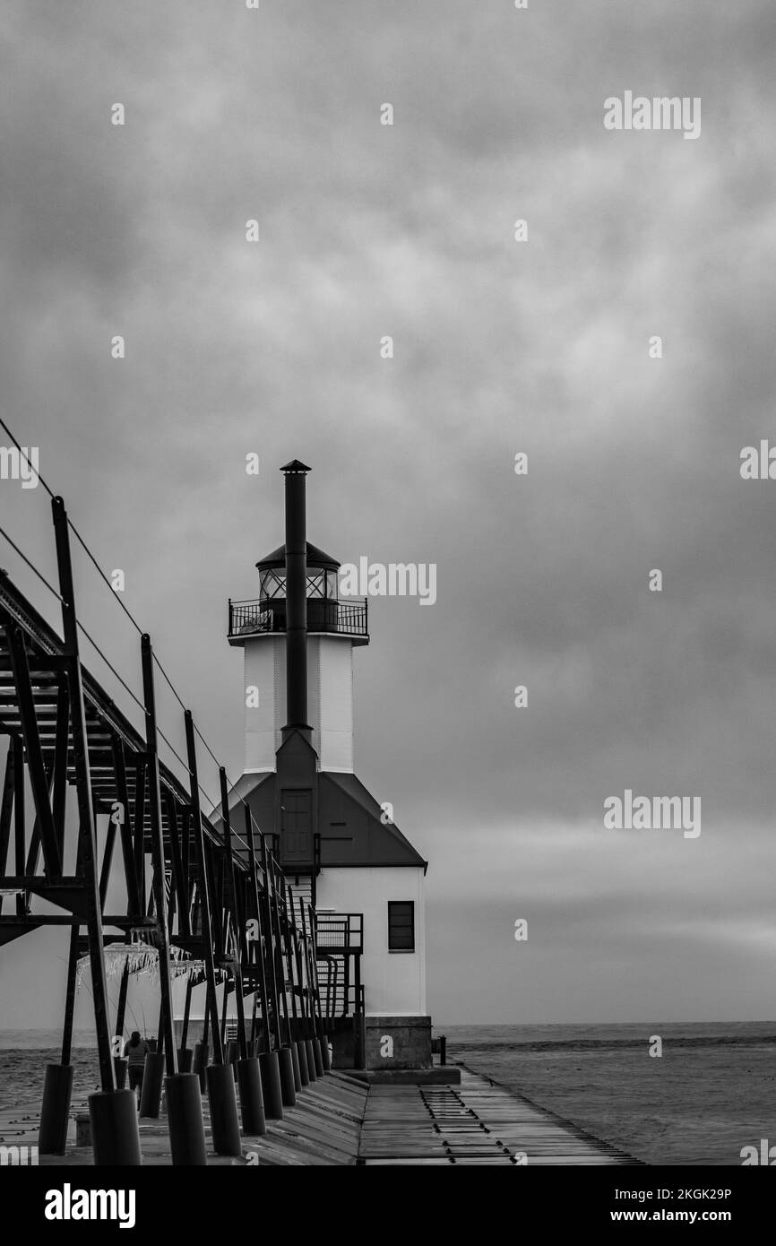 A vertical grayscale shot of St Joseph North Pier Inner Lighthouse ...