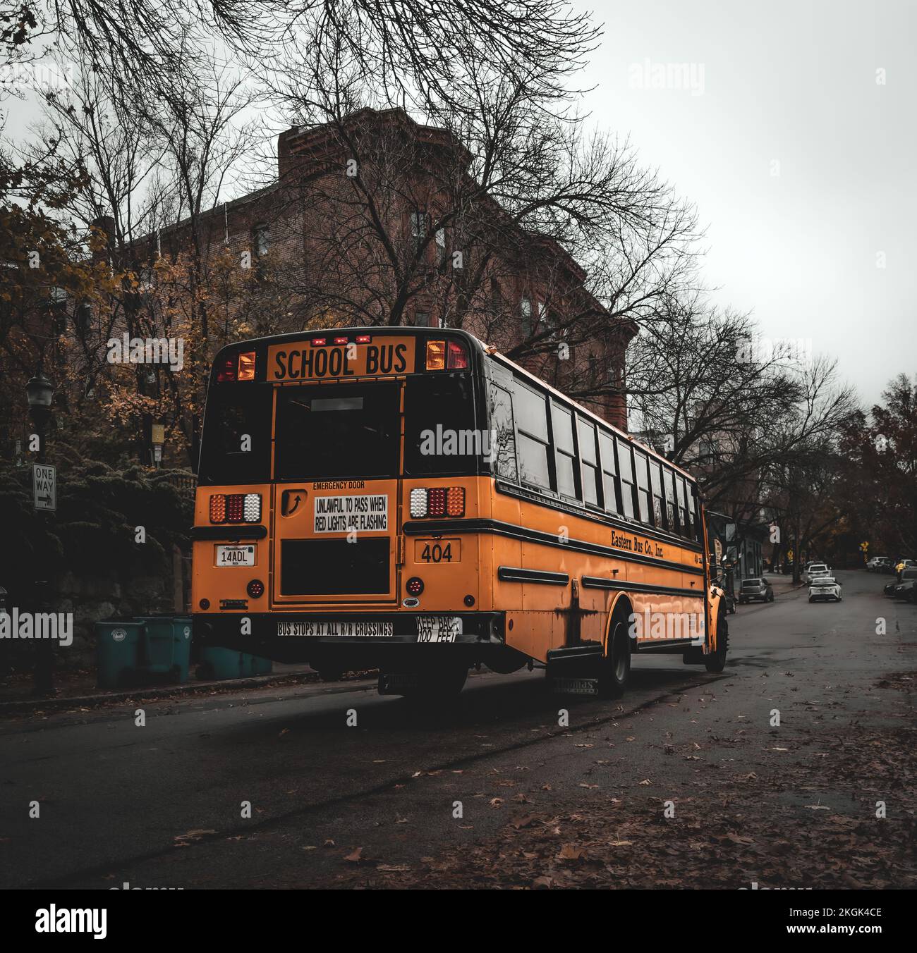 A school bus driving on the street in Brookline town, Massachusetts ...