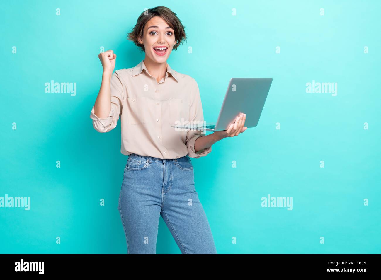 Photo of young attractive nice business lady excited hooray fist up ...
