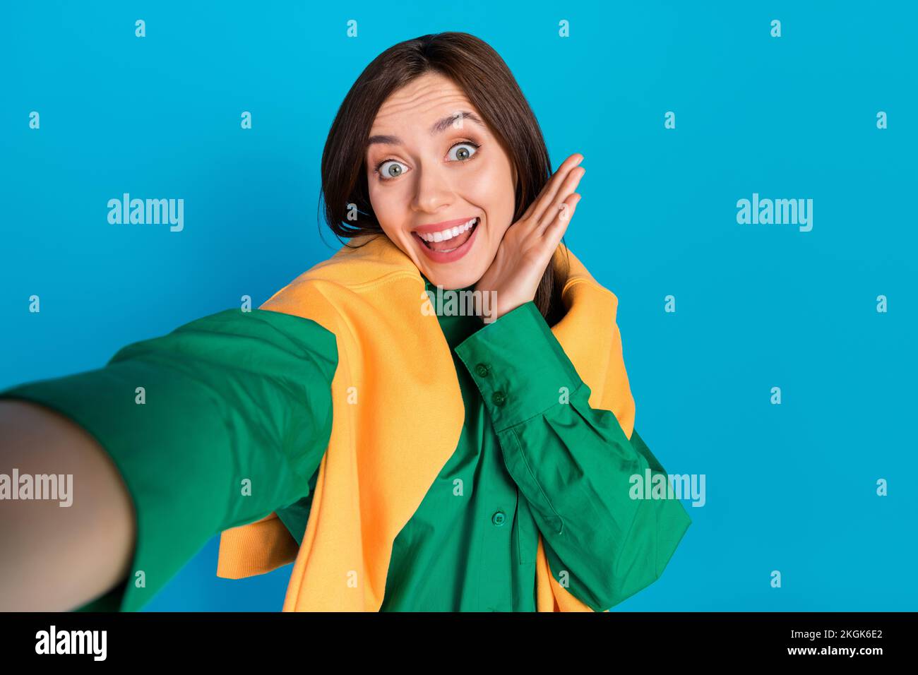 Portrait of cheerful astonished girl take selfie toothy smile hand ...