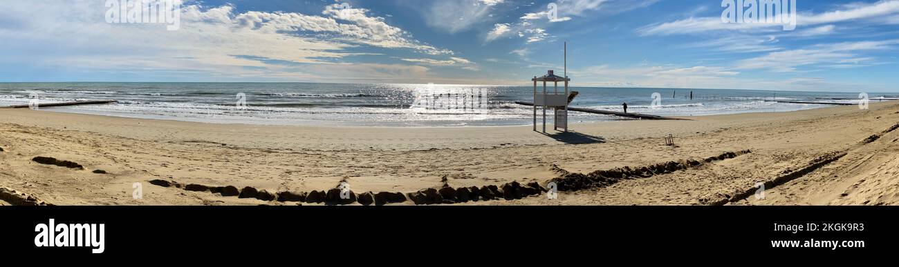 A panoramic view of sandy beach on a sunny morning Stock Photo - Alamy
