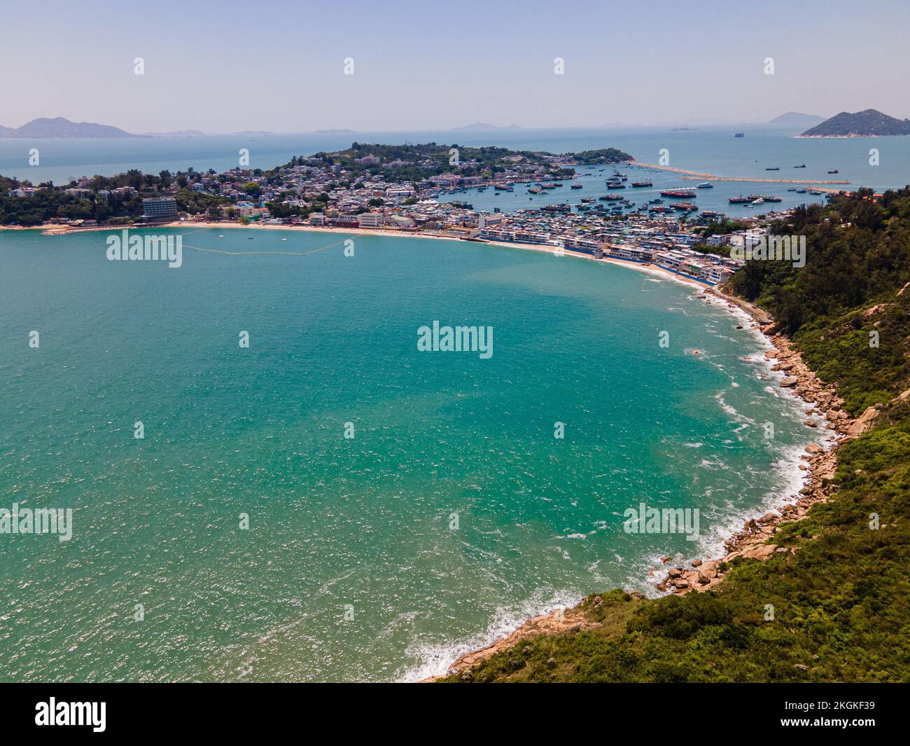 An aerial view of the forested coast and sea in Cheung Chau, Hong Kong ...