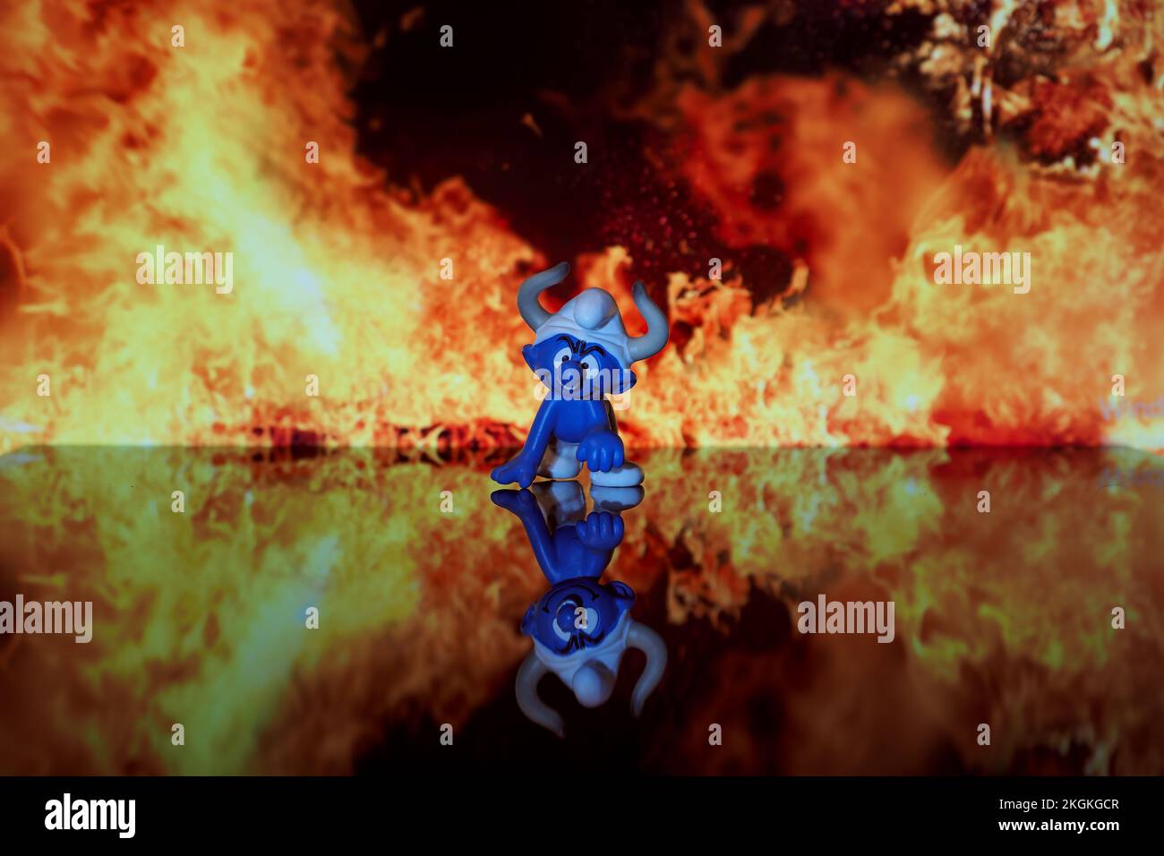 The Smurf of Taurus zodiac sign in the background of fire flames Stock ...