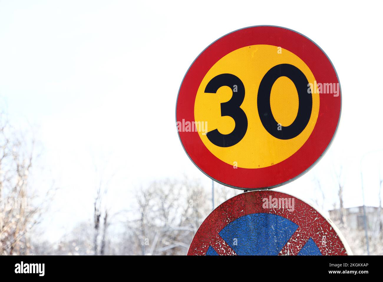 Seasonal weather, a road sign Stock Photo - Alamy