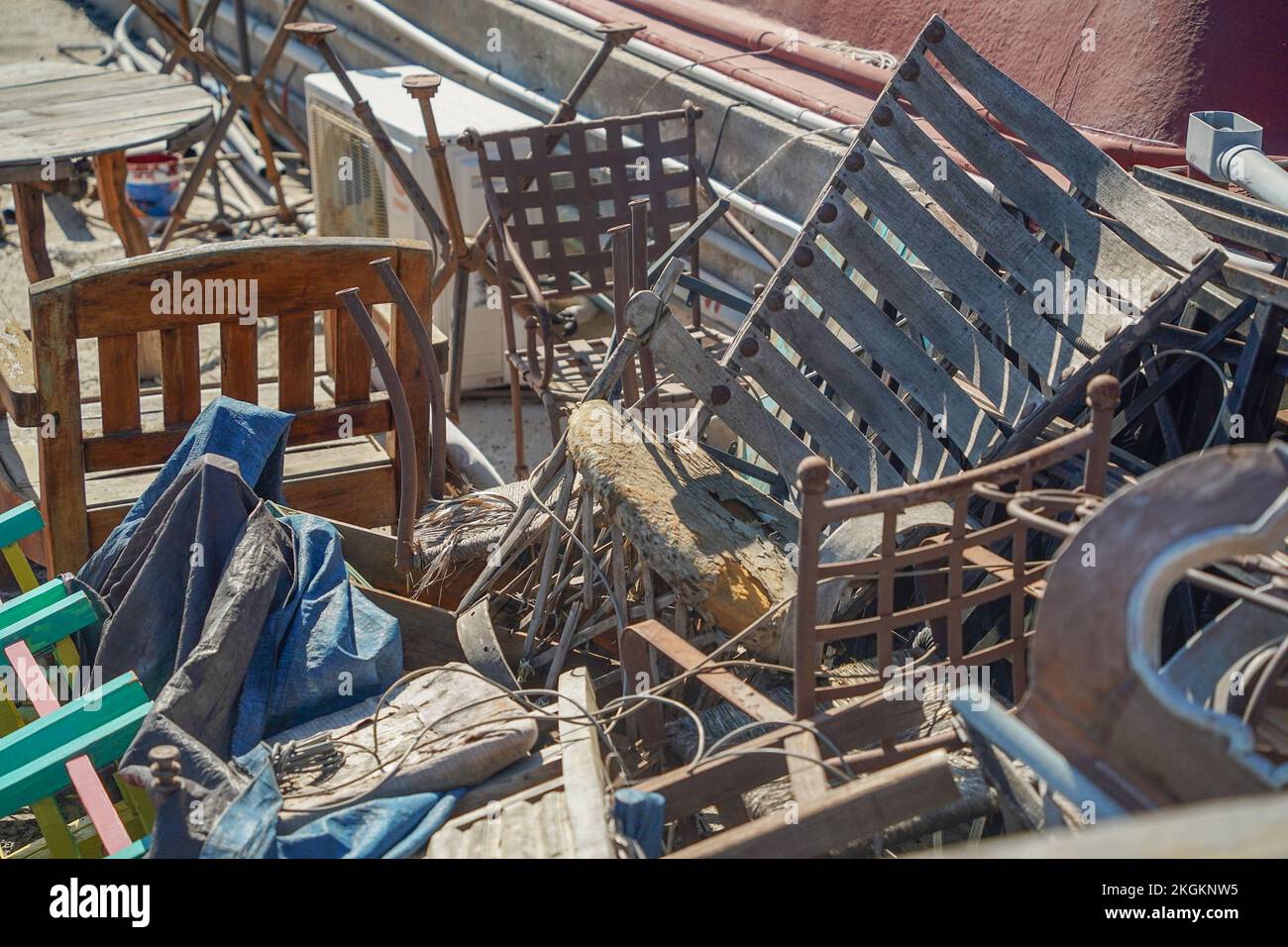 many abandoned old chairs junk detail Stock Photo - Alamy