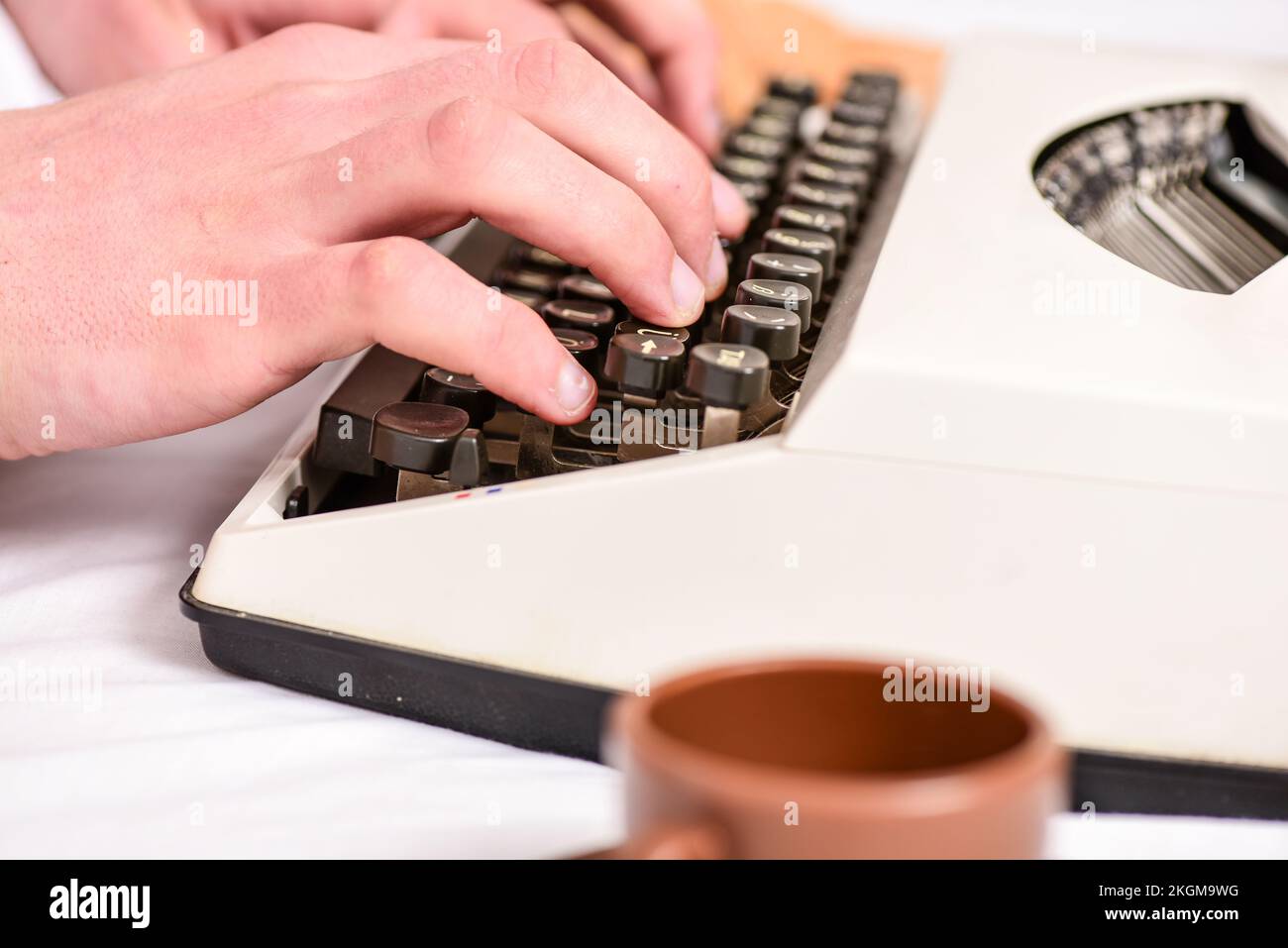 Writing routine. Vintage typewriter concept. Hands typing retro writing machine. Old typewriter ...