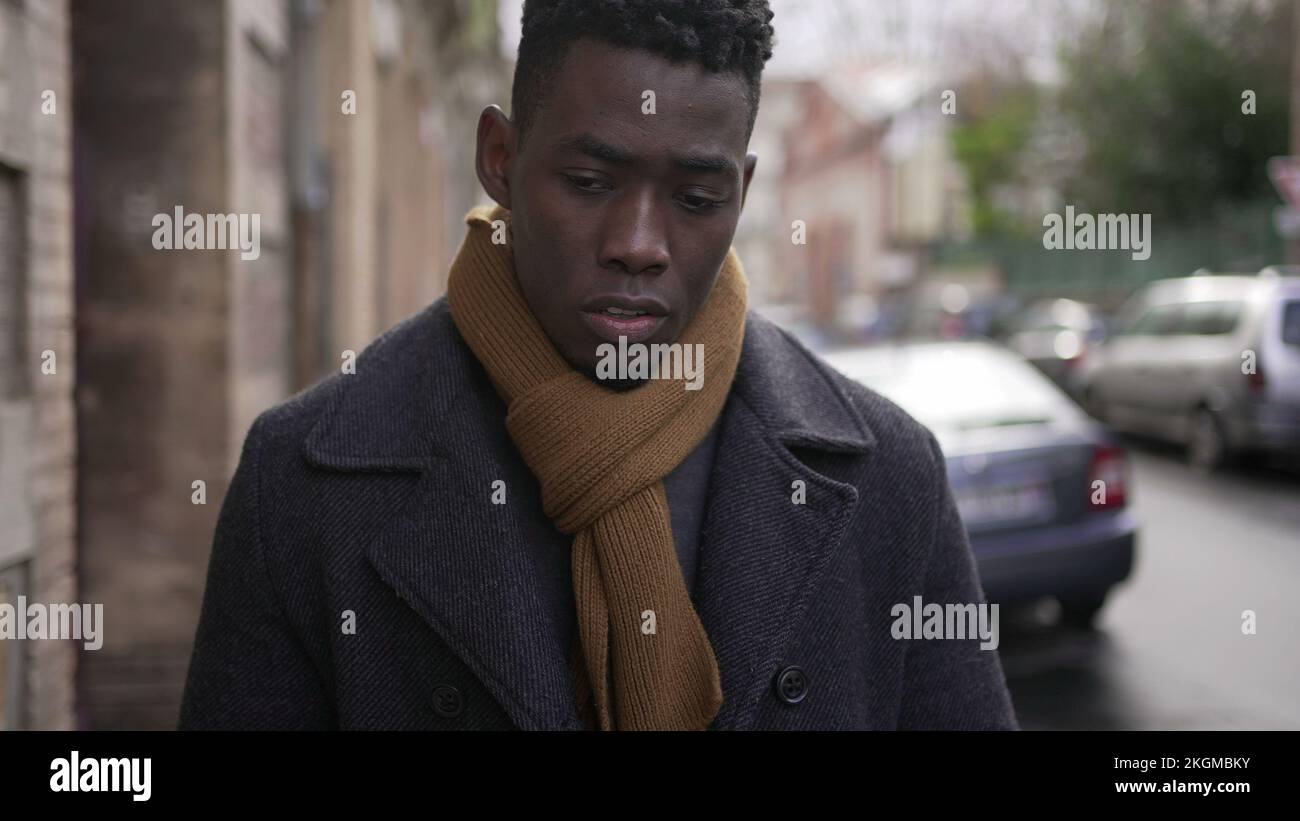 Upset black man walking in city. Angry frustrated person emotion Stock ...