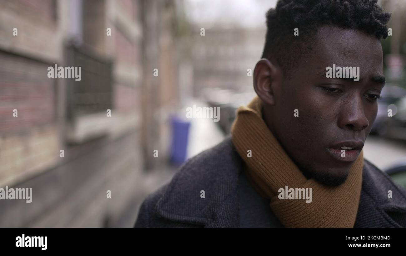 Upset black man walking in city. Angry frustrated person emotion Stock ...