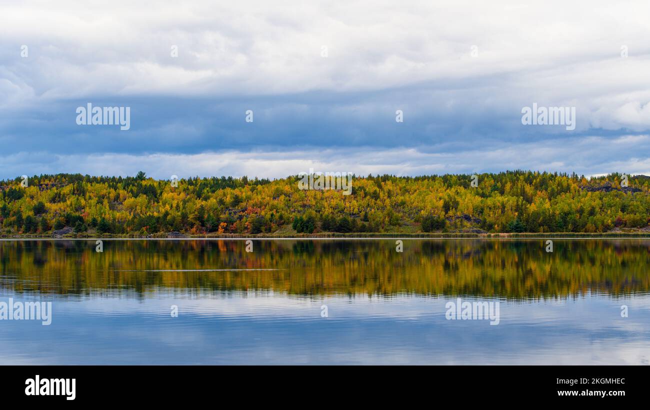 Autumn reflections in Kelly Lake, Greater Sudbury, Ontario, Canada ...